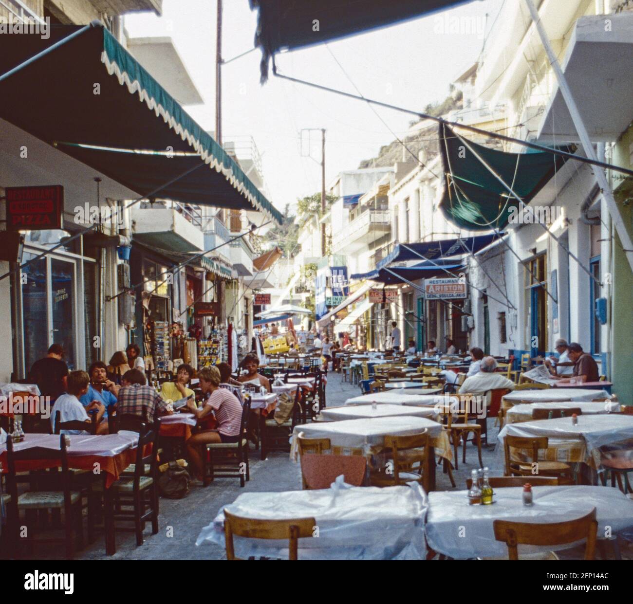 Archival image. Cafes and restaurants are ready with tables covered ...