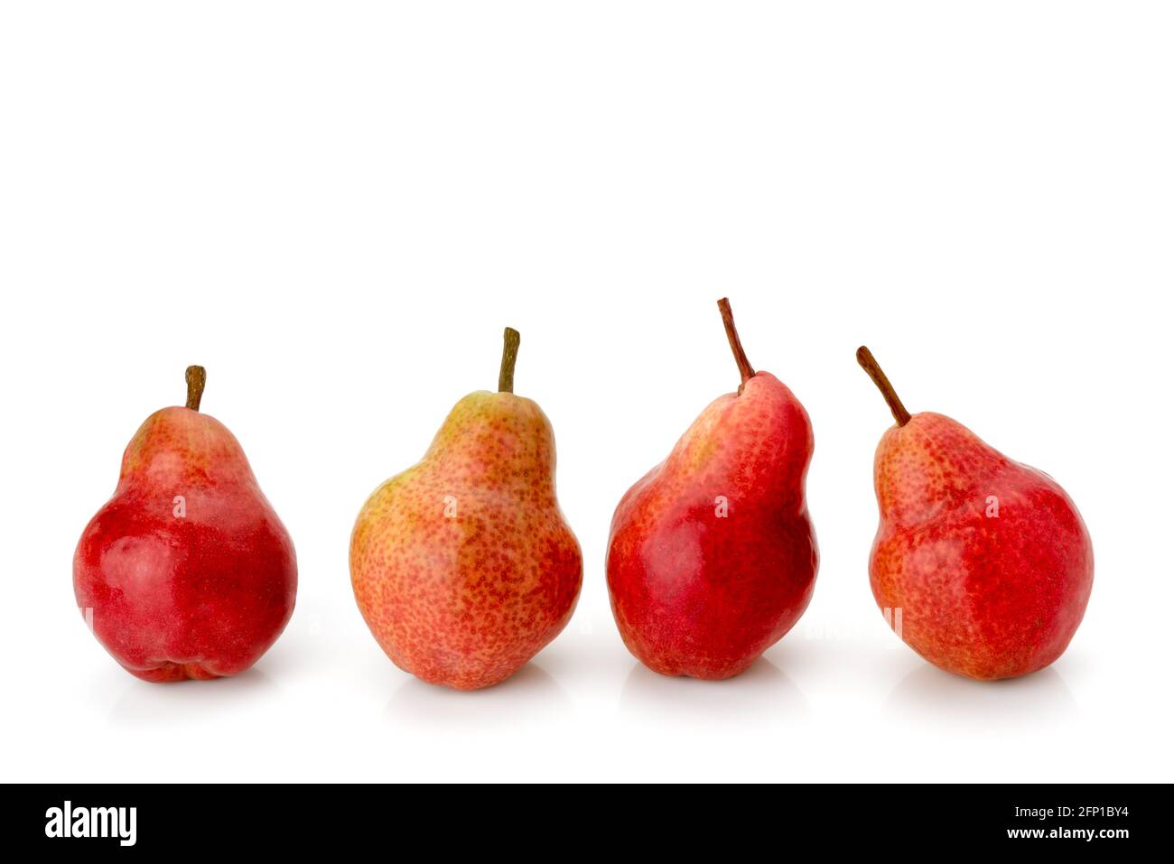 William Max Red Bartlett pear, four pears isolated on white background ...