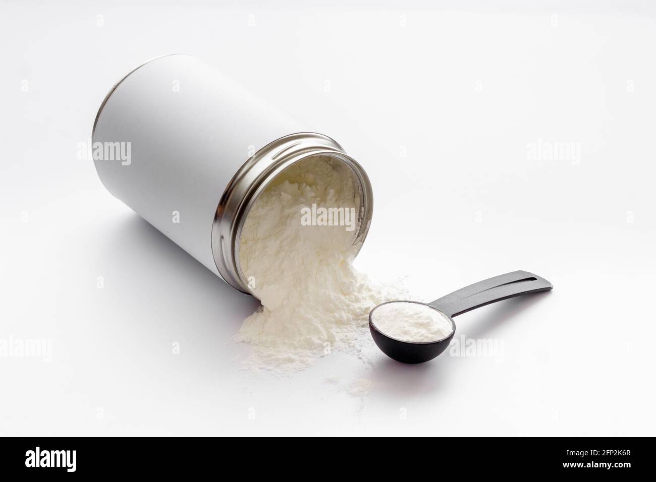 Sport nutrition - whey protein powder in scoop and jar Stock Photo - Alamy