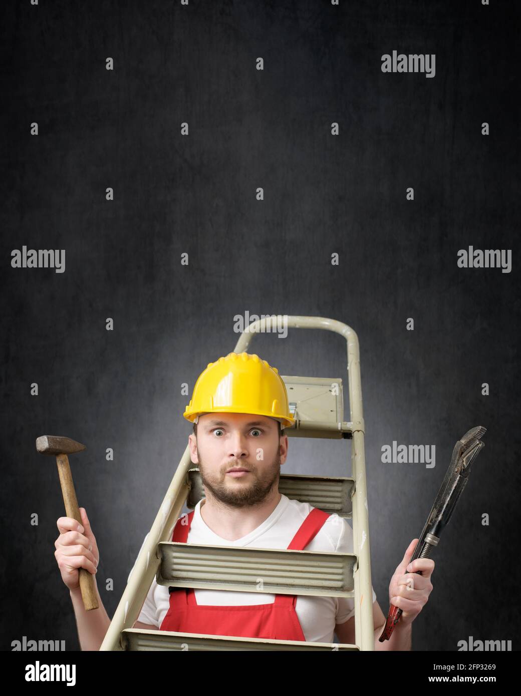 Man ladder plumbing tools hi-res stock photography and images - Alamy