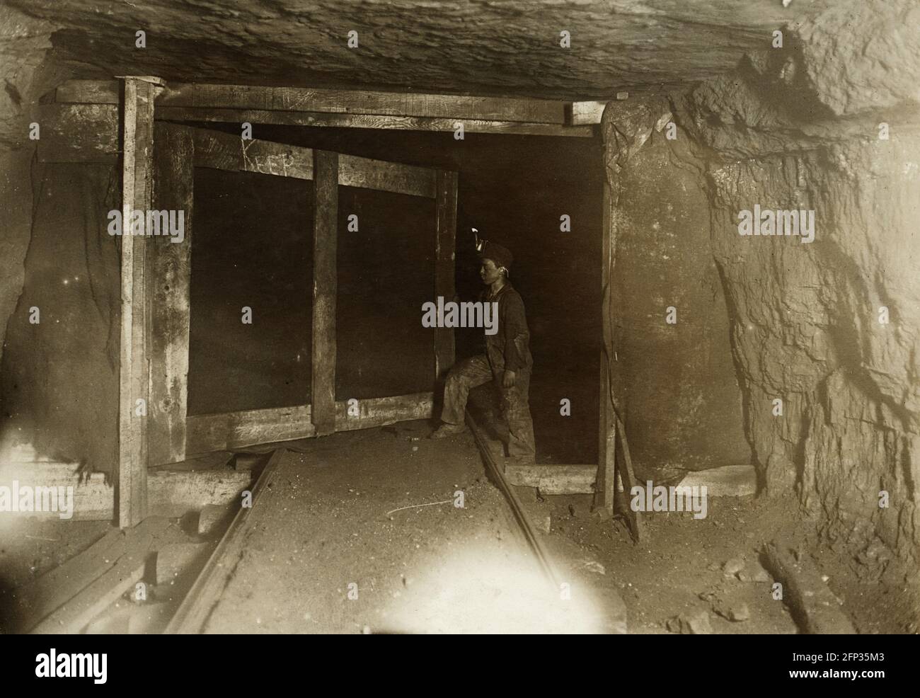 Child Labour: A trapper boy, reponsable for opening and closing the ...