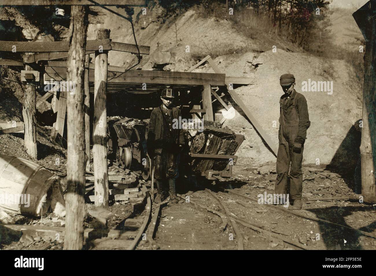 Child Labour: A 12-14 year old coupling boy at a coal mine n Tennessee ...