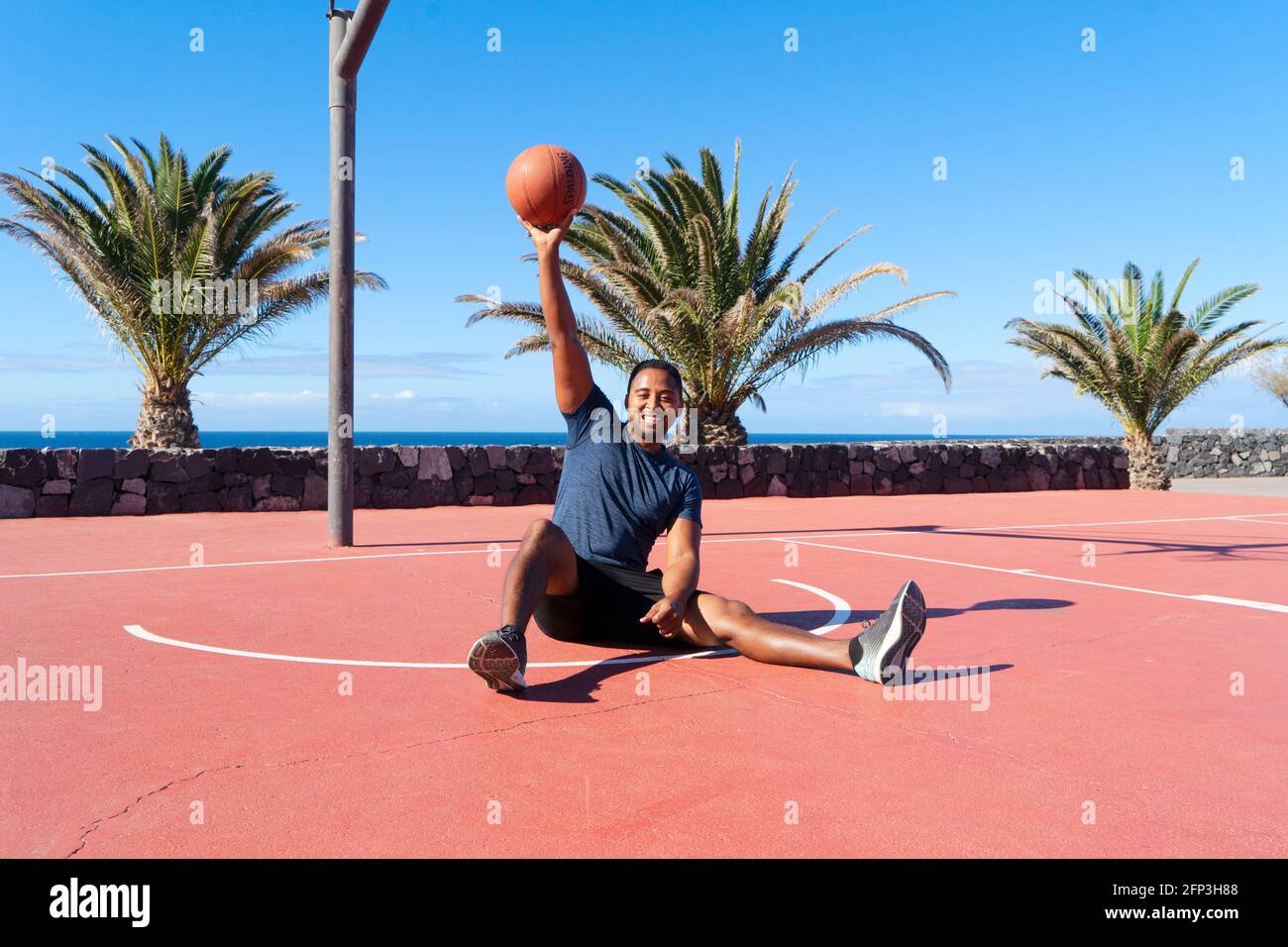 Afro male athlete practicing exercise hi-res stock photography and ...
