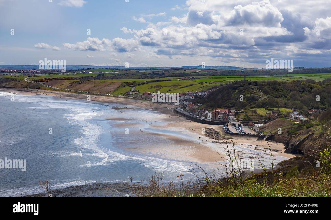 A view of Sandsend from the Cleveland Way cliff walk, with tiny people ...