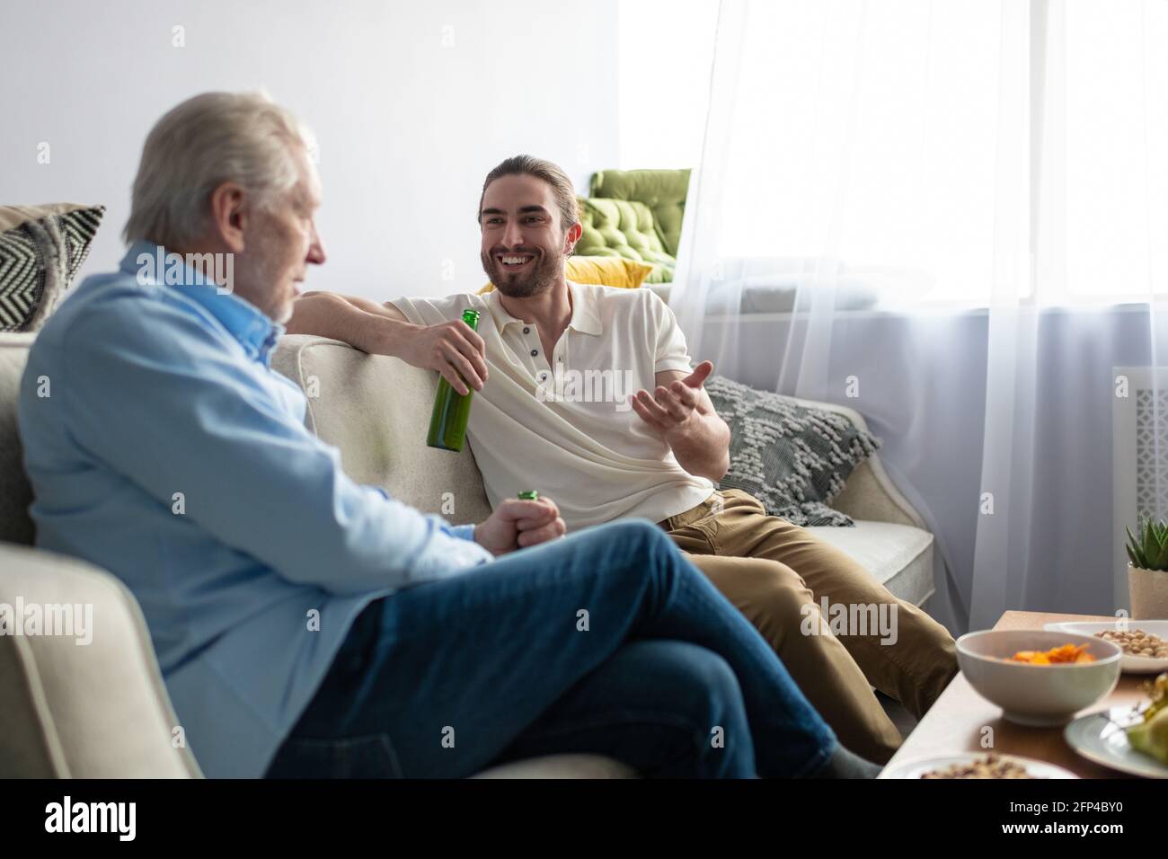 Grandfather grandson conversation hi-res stock photography and images ...