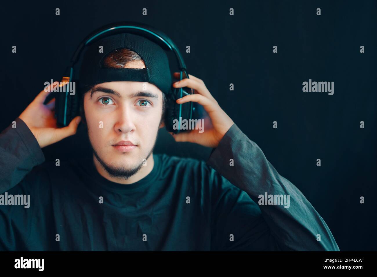 Cyber sport. Young handsome game streamer finally wins a round in a ...