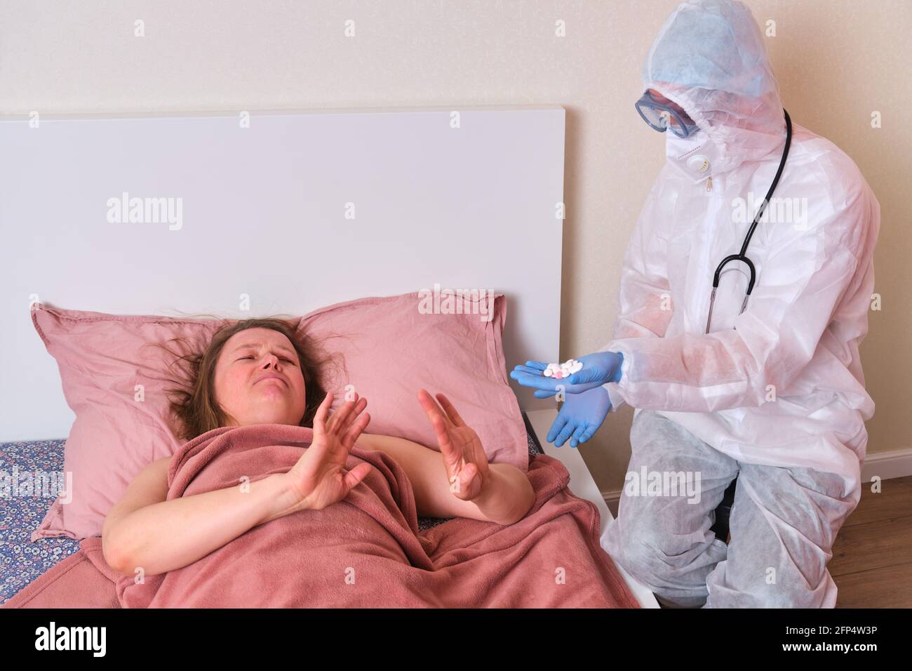 Refusal of an adult woman from treatment and pills Stock Photo - Alamy