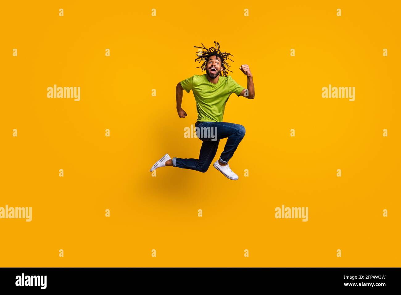 Young man dreads running on hi-res stock photography and images - Alamy