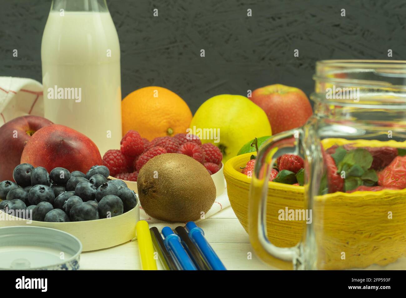 Fresh fruit and milk for making a milkshake. Ingredients for making ...