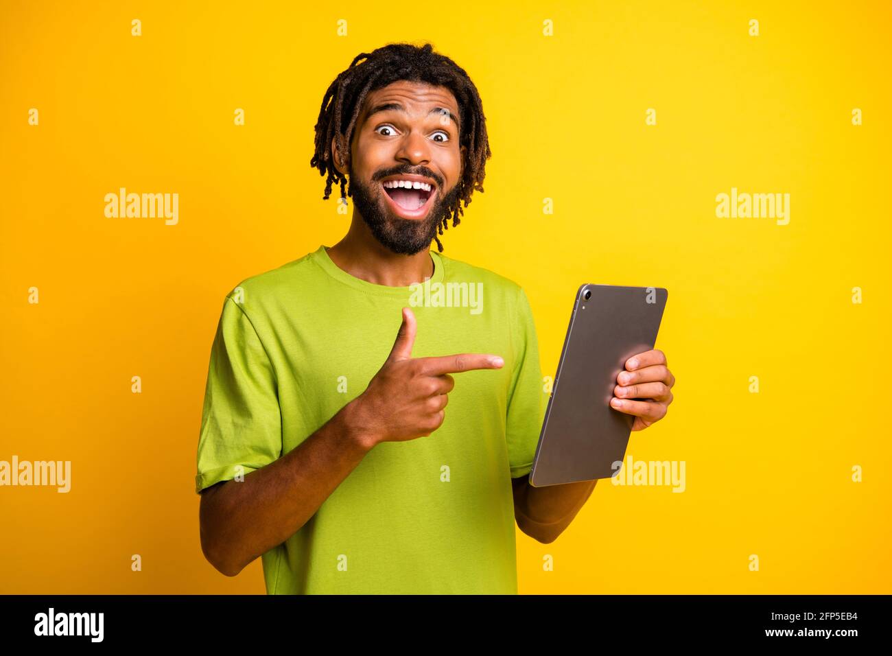 Photo of young handsome man excited happy smile show point finger ...
