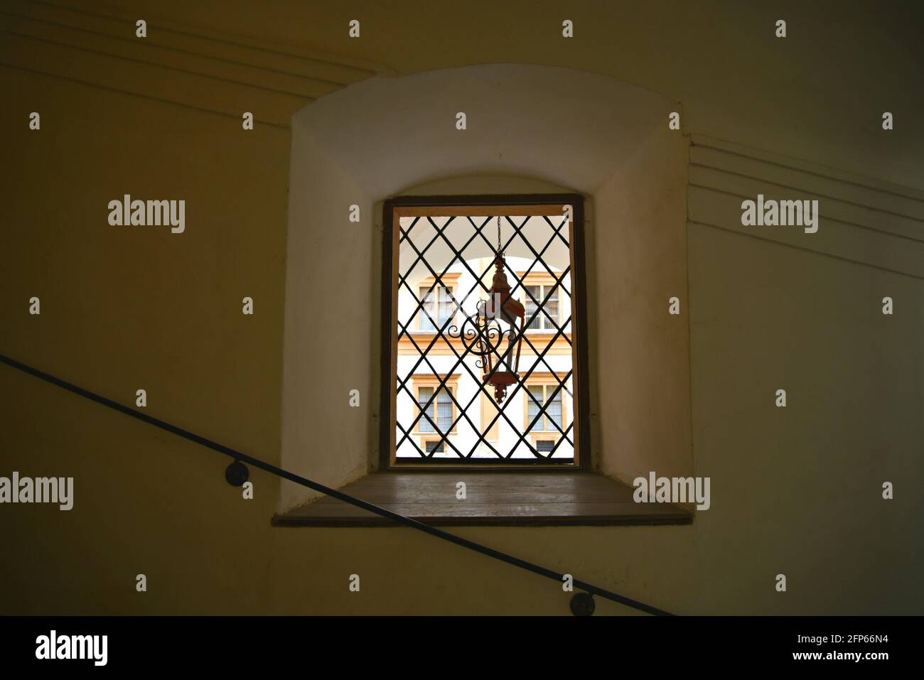 Window and iron stairway railing view at Schloss Eggenberg a 17th ...