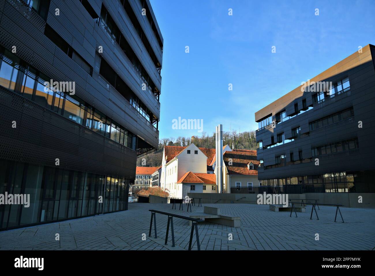 Landscape with scenic view of modern steel and glass buildings in Graz ...
