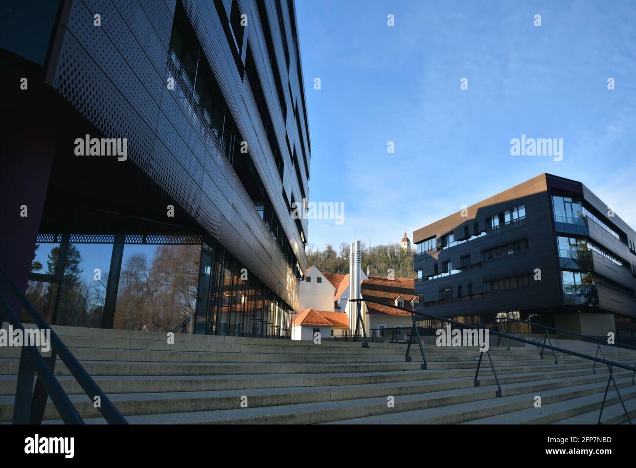 Landscape with scenic view of modern steel and glass buildings in Graz ...