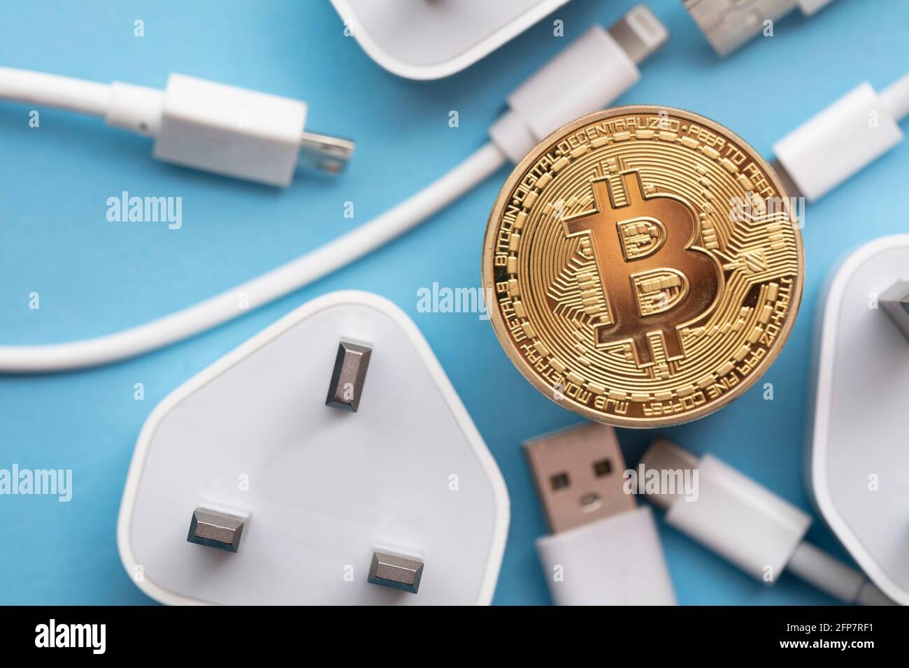 bitcoin cryptocurrency energy consumption concept. Gold coin with ...