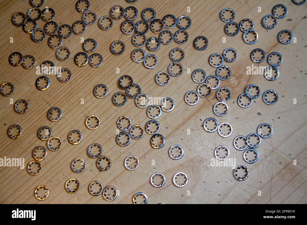 A heap of small serrated lock washers Stock Photo - Alamy