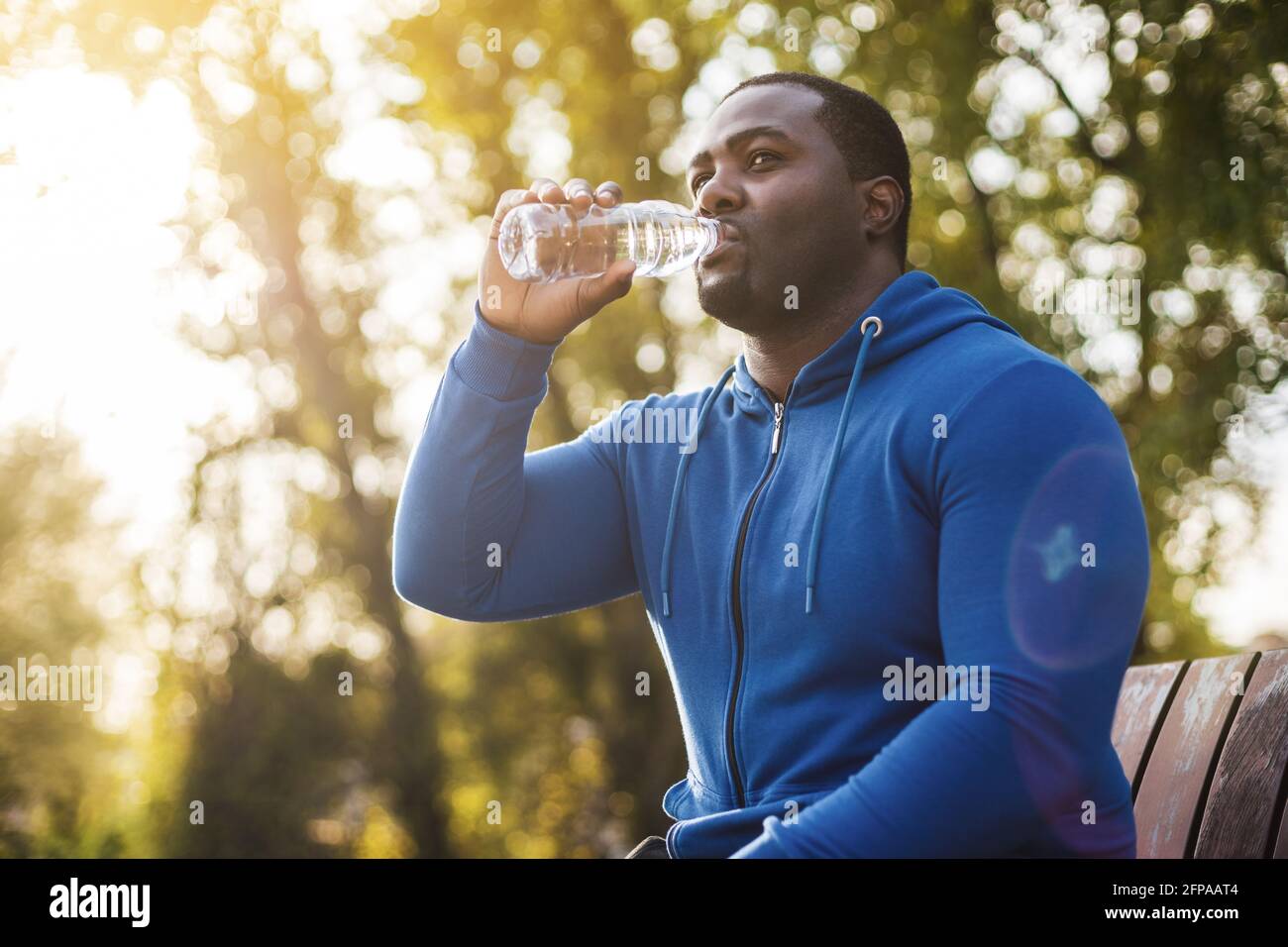 Fat Man Sitting On Bench High Resolution Stock Photography and Images ...