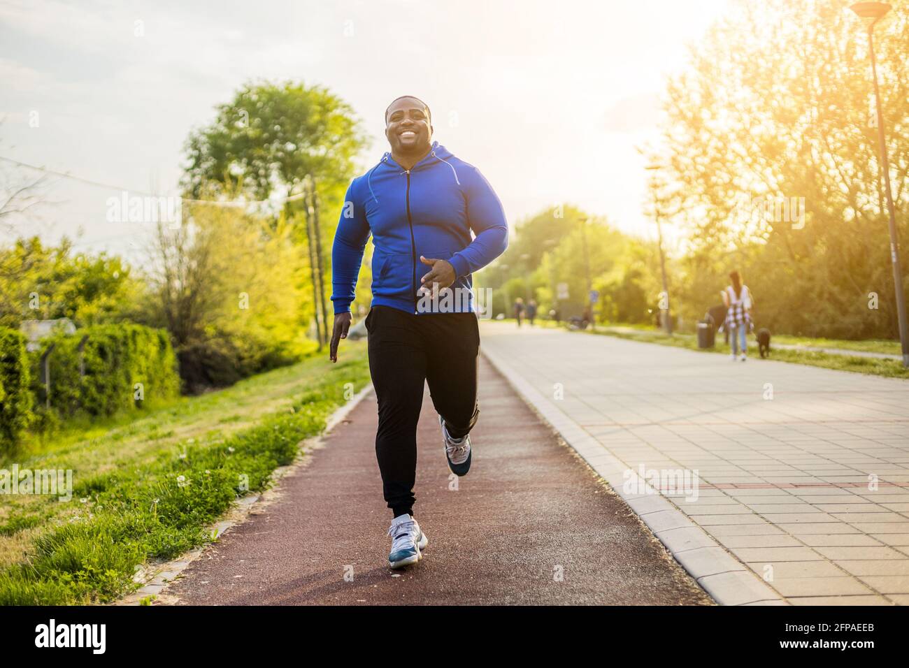 Overweight man jogging hi-res stock photography and images - Alamy
