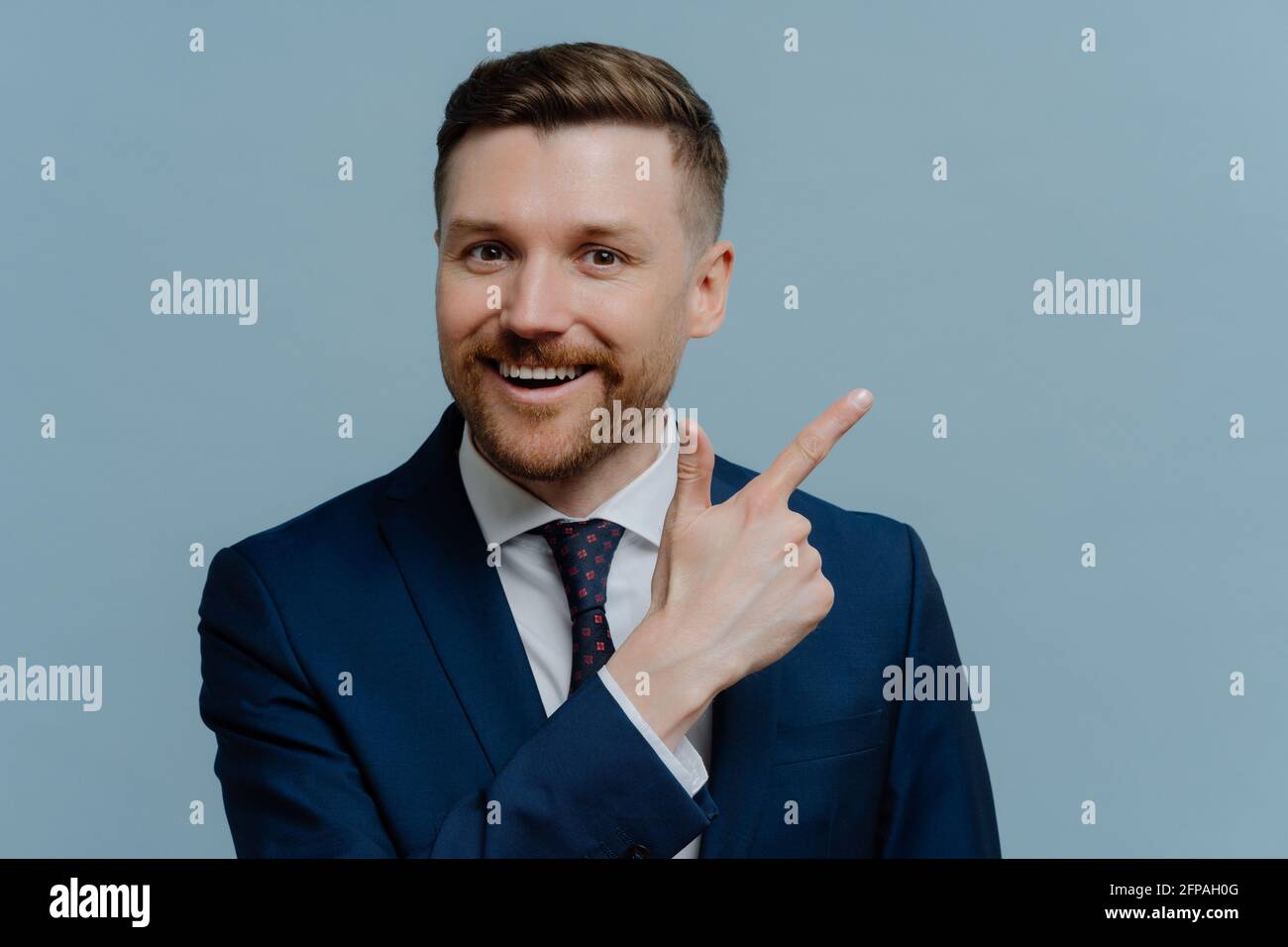 Isolated man mouth open pointing hi-res stock photography and images ...