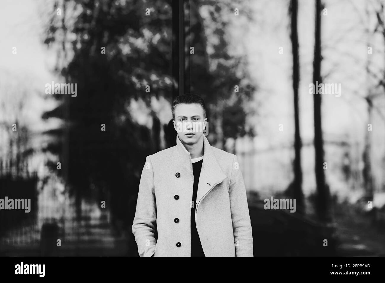 Men model wearing coat hi-res stock photography and images - Alamy