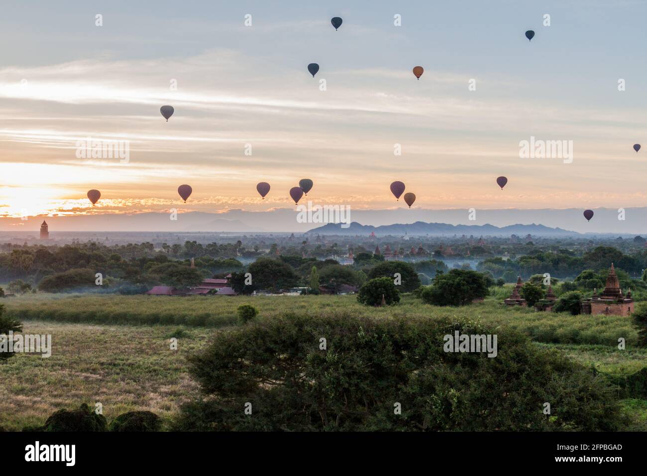 Balloons over Bagan and the skyline of its temples, Myanmar Stock Photo ...