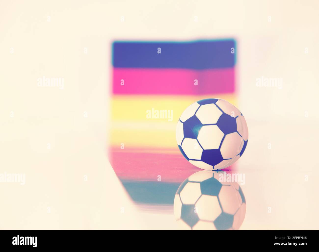 Soccer ball with the German flag as background, concept of German ...