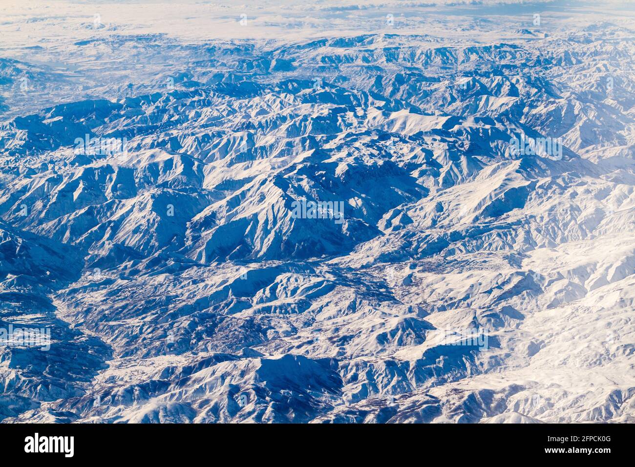 Aerial view of snow covered mountains in northwestern Iran Stock Photo ...