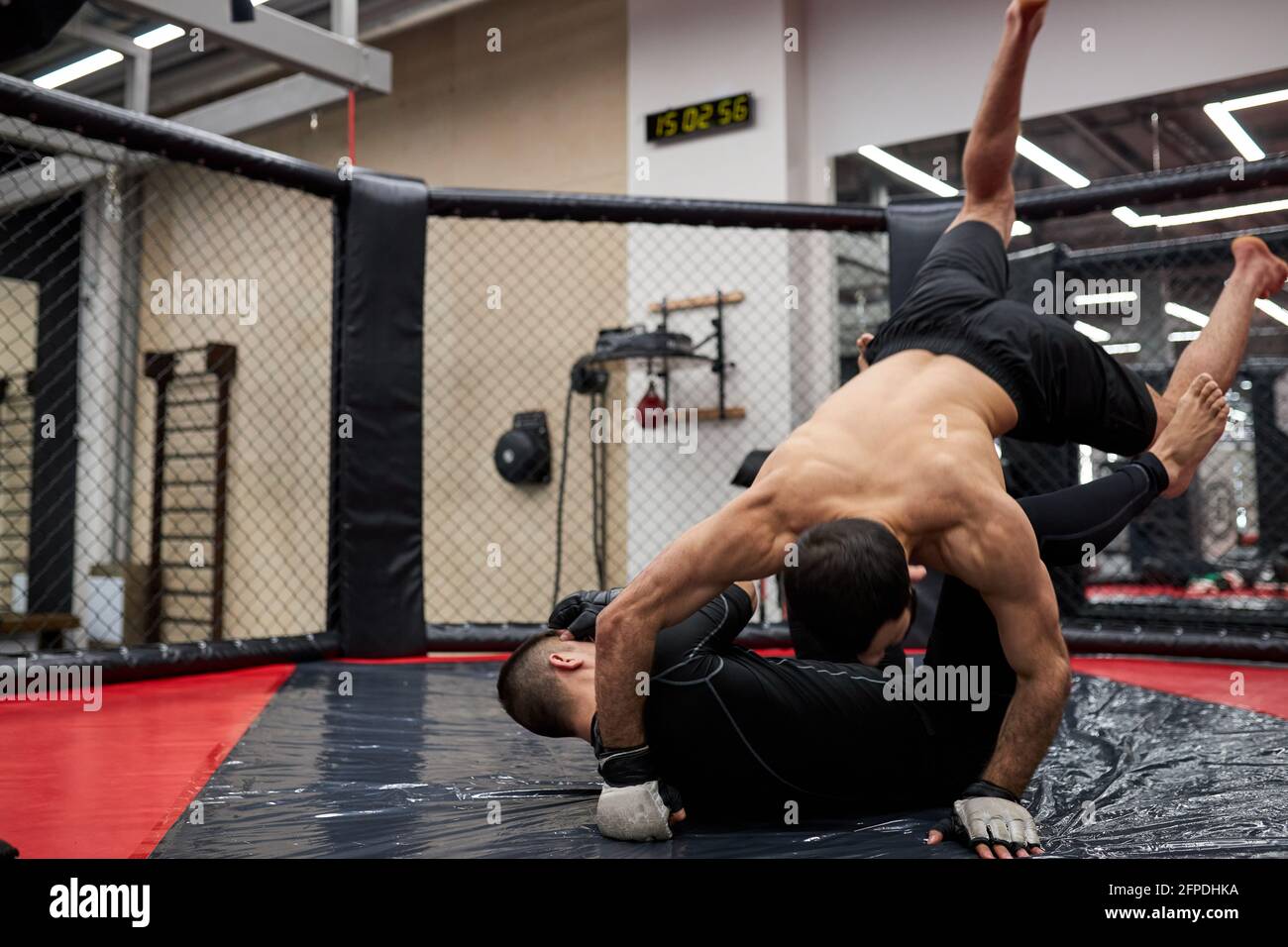 Mixed martial artists before fight, two caucasian MMA fighters fight on ...