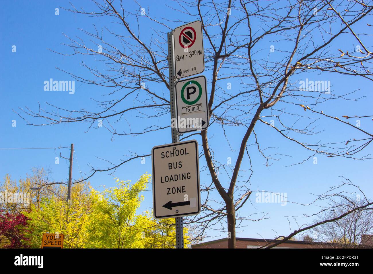 School bus loading zone sign Stock Photo - Alamy