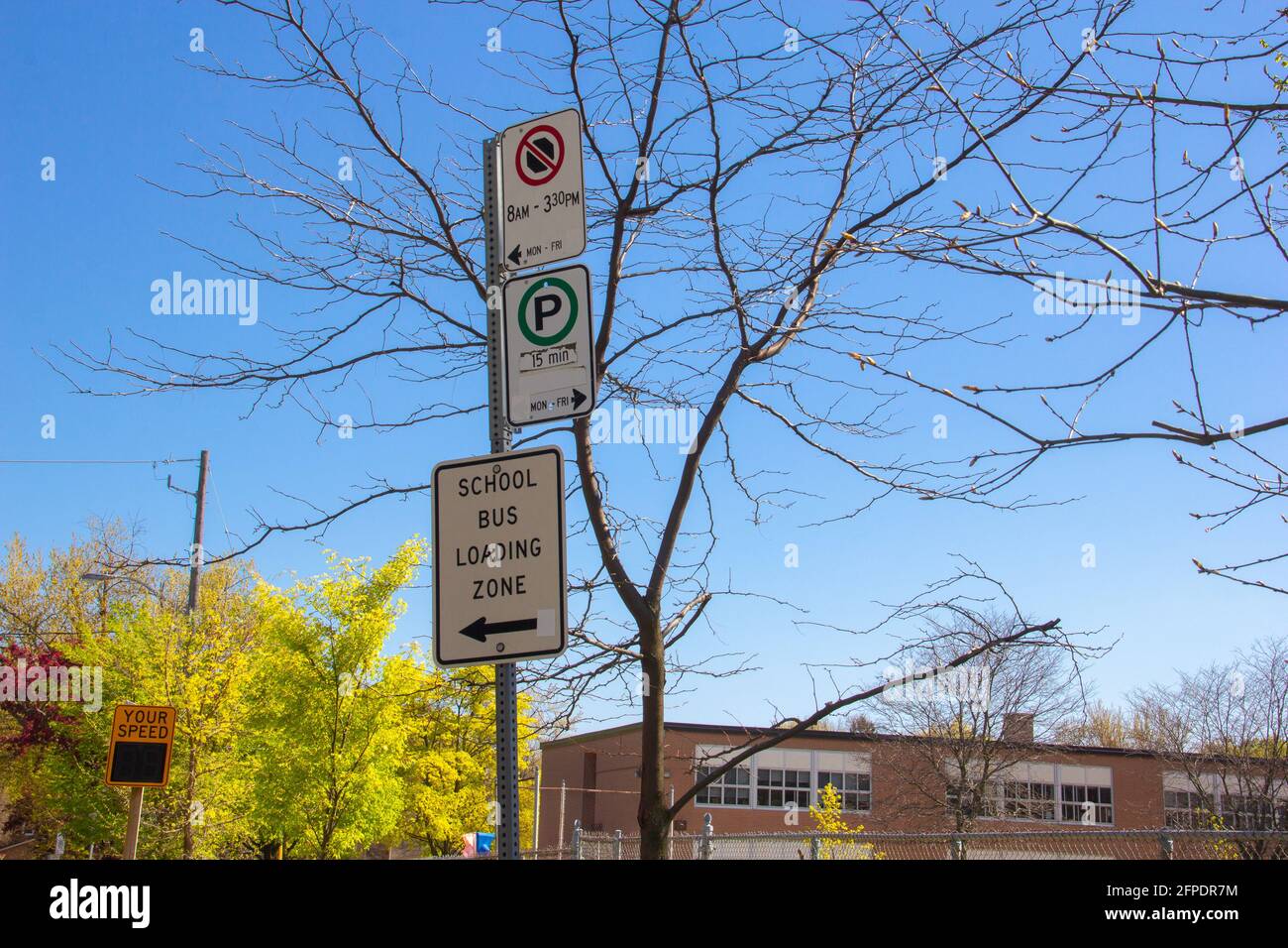 School bus loading zone sign Stock Photo - Alamy