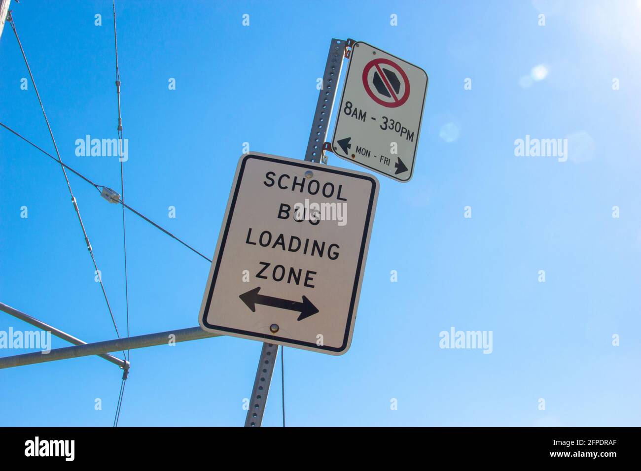 School bus loading zone sign Stock Photo - Alamy