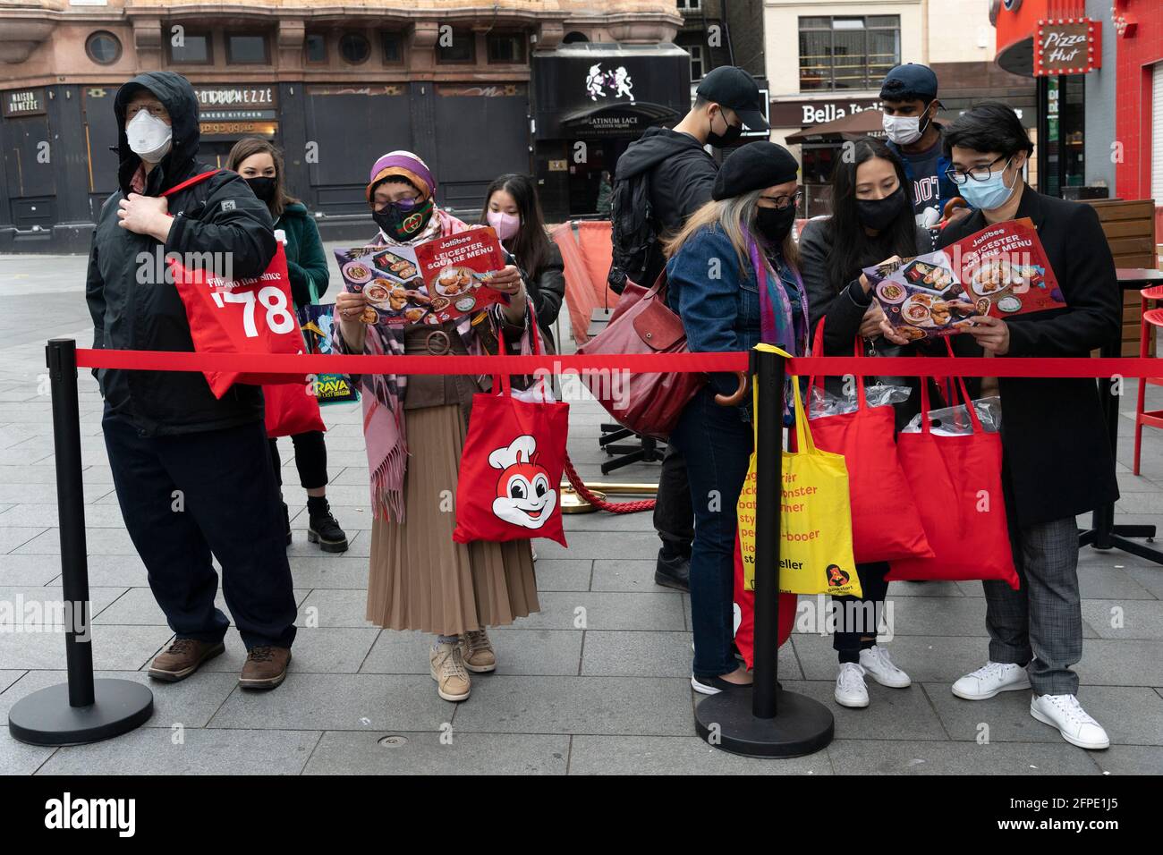 20 May 2021 .London, United Kingdom. Customers queue up to enter the ...