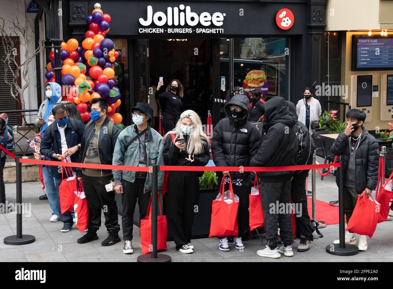 20 May 2021 .London, United Kingdom. Customers queue up to enter the ...