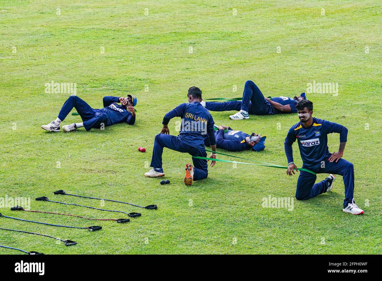Sri Lankan cricketers stretch during a training session at the Sher-e ...