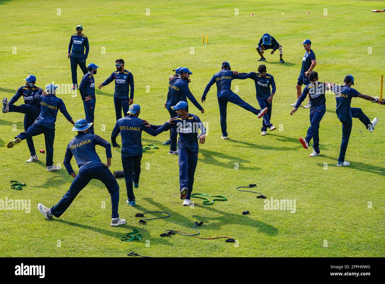 Sri Lankan cricketers stretch during a training session at the Sher-e ...