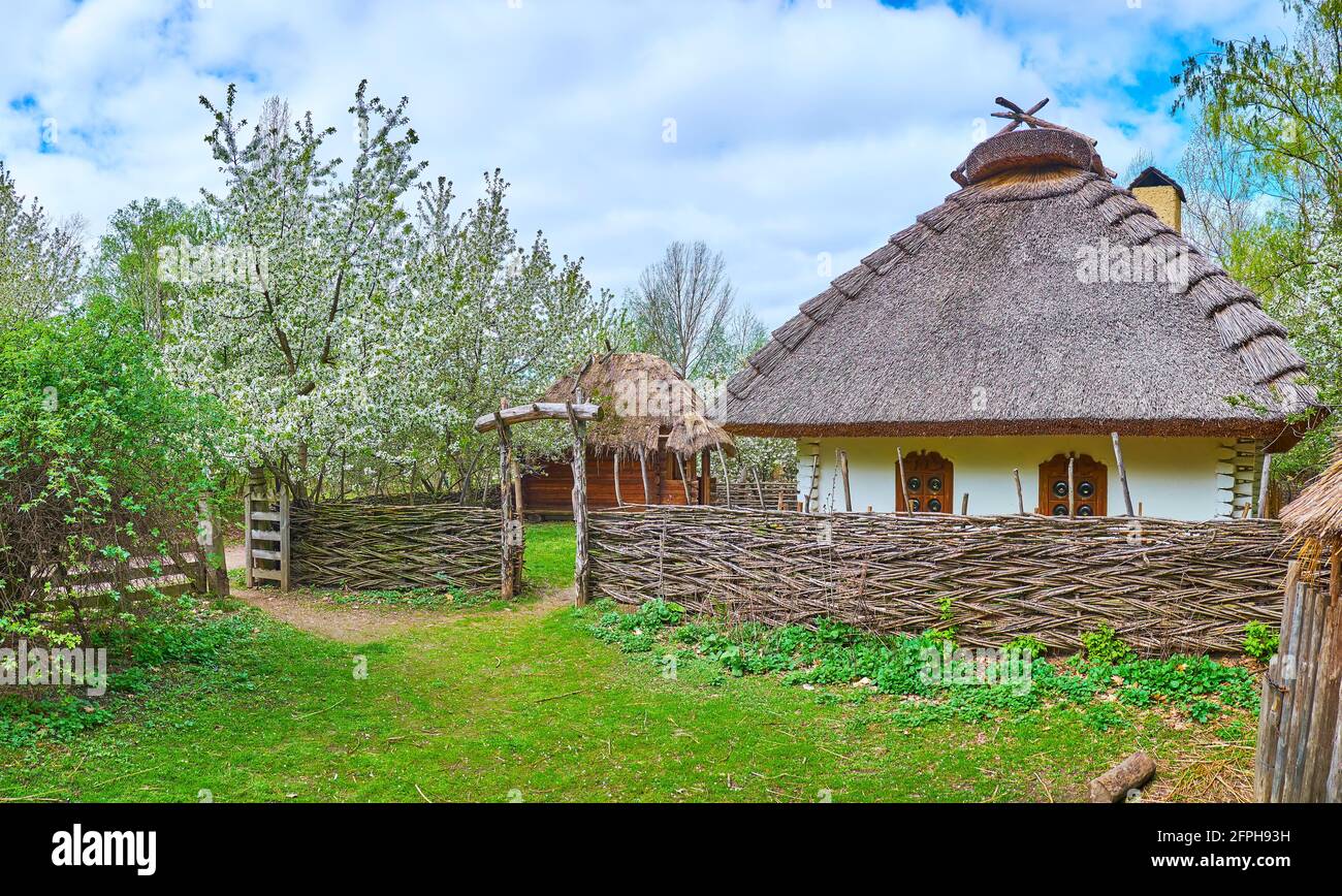 Panorama of the Cossack's Estate with wicker fence, hata house with ...