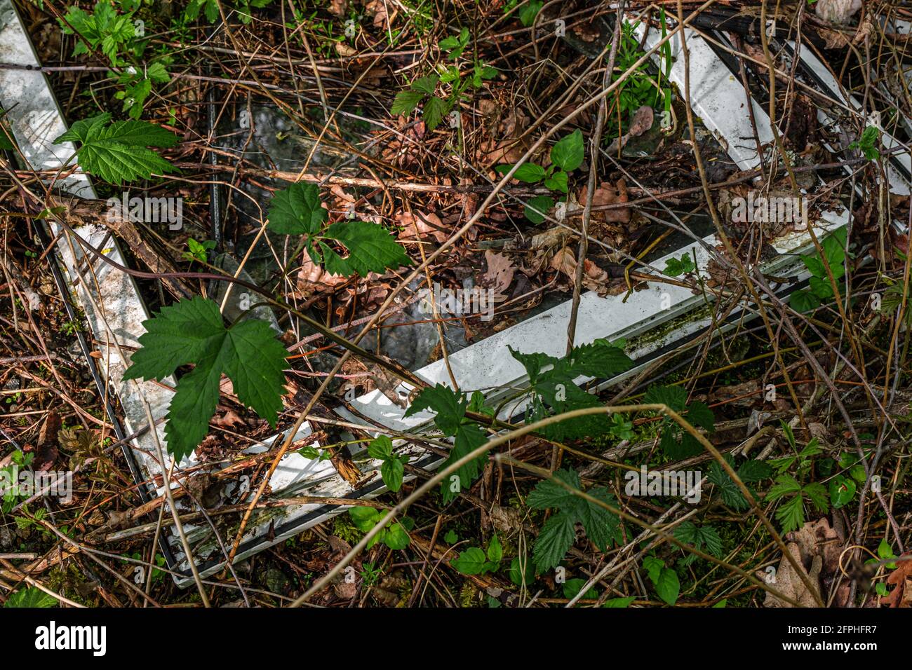 PVC window frames discarded in nature Stock Photo - Alamy
