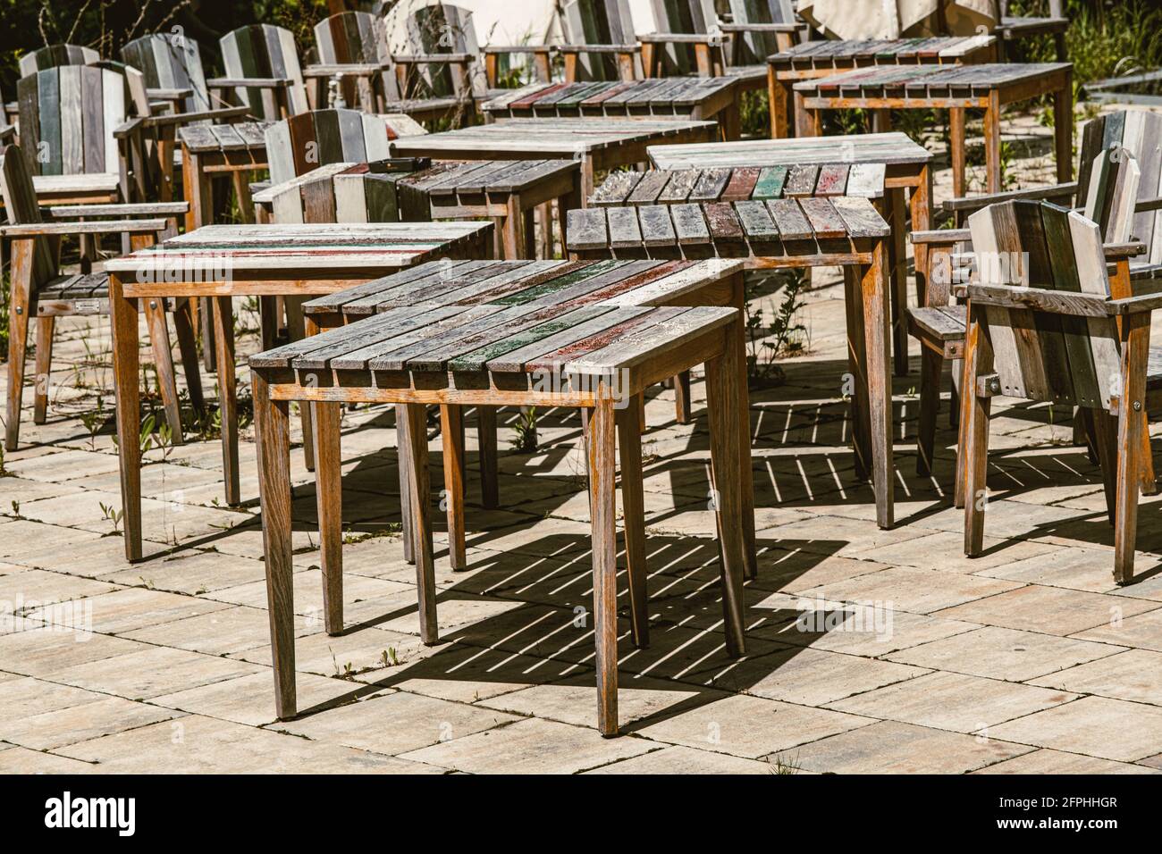 abandoned restaurant table and chairs Stock Photo - Alamy