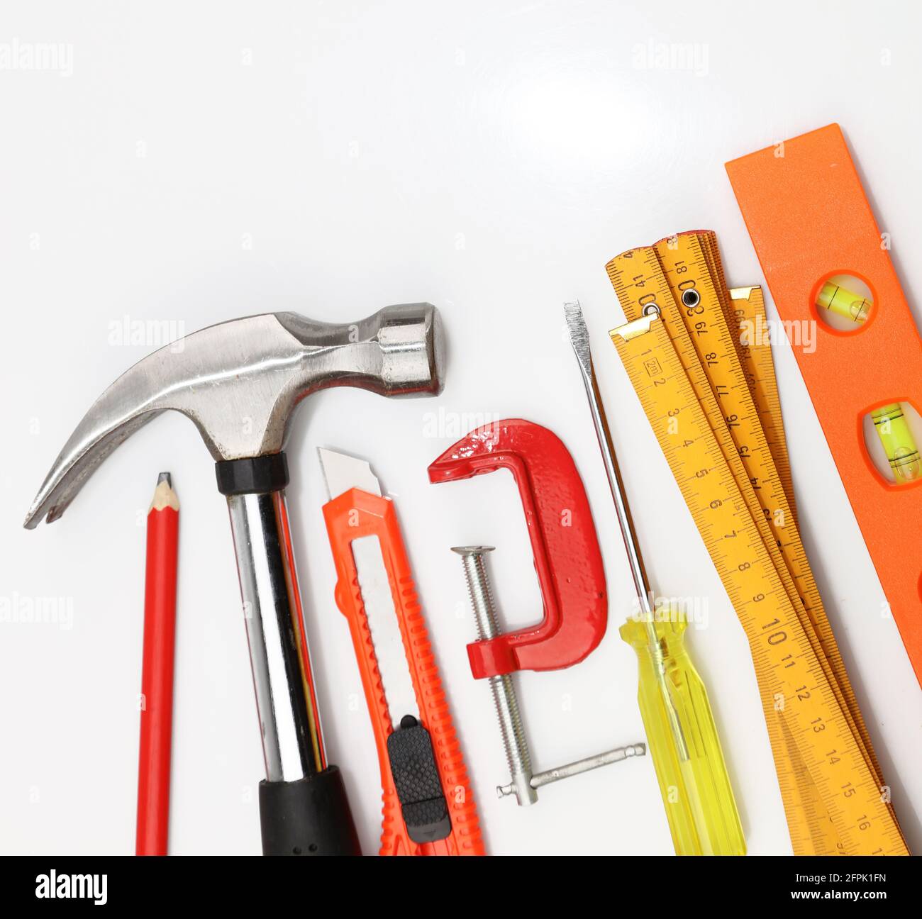 Assortment of tools on plain background Stock Photo - Alamy