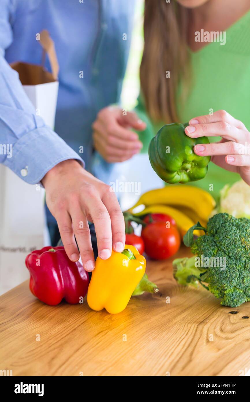 Man and woman living vegetarian and healthy by eating fruits and ...