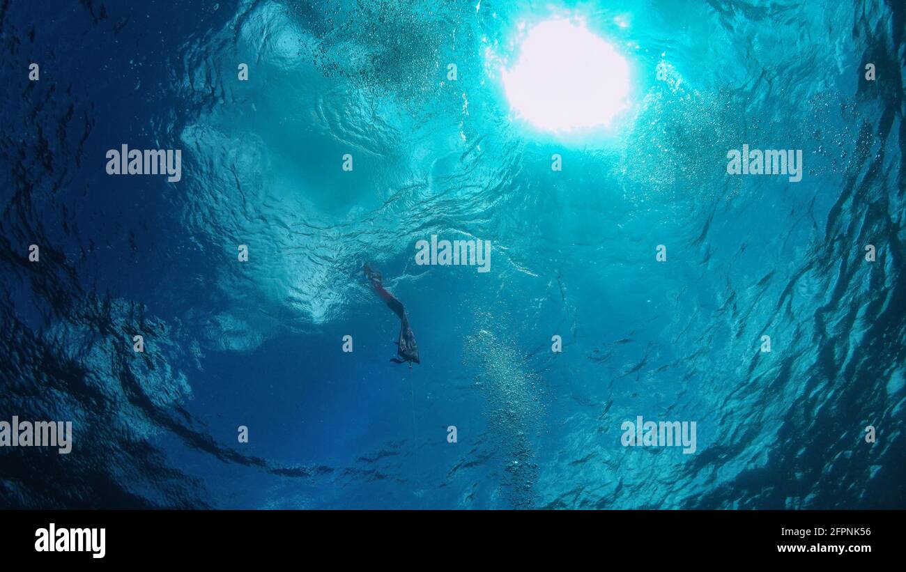 View from underwater at scuba diving marker Buoy flloating at water ...