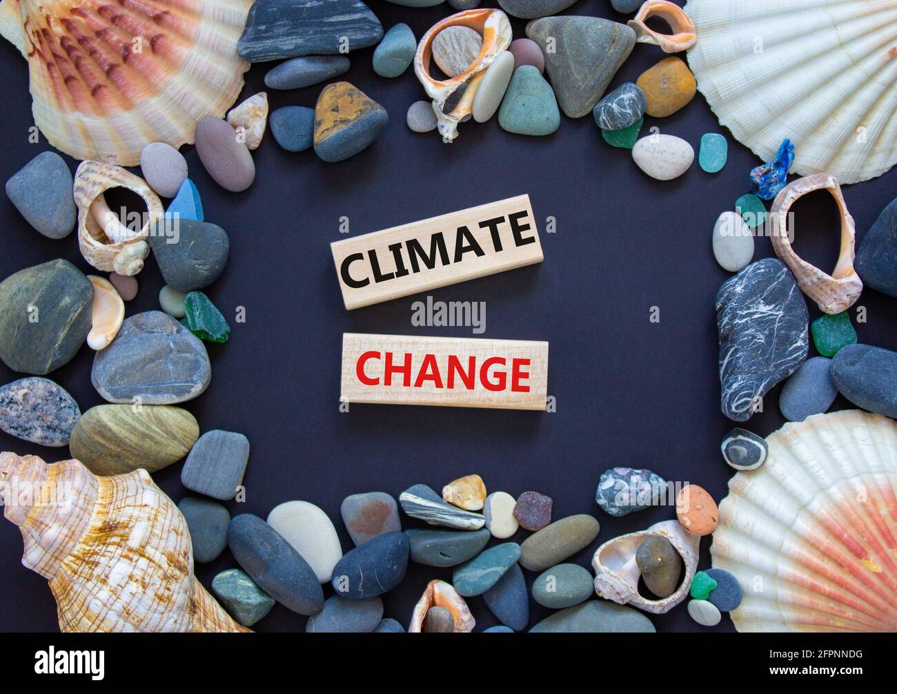 Climate change symbol. Wooden blocks with words 'Climate change' on ...