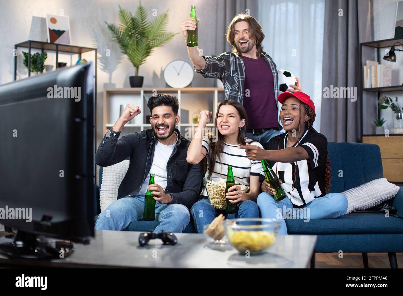 Group of indian fans shouting hi-res stock photography and images - Alamy