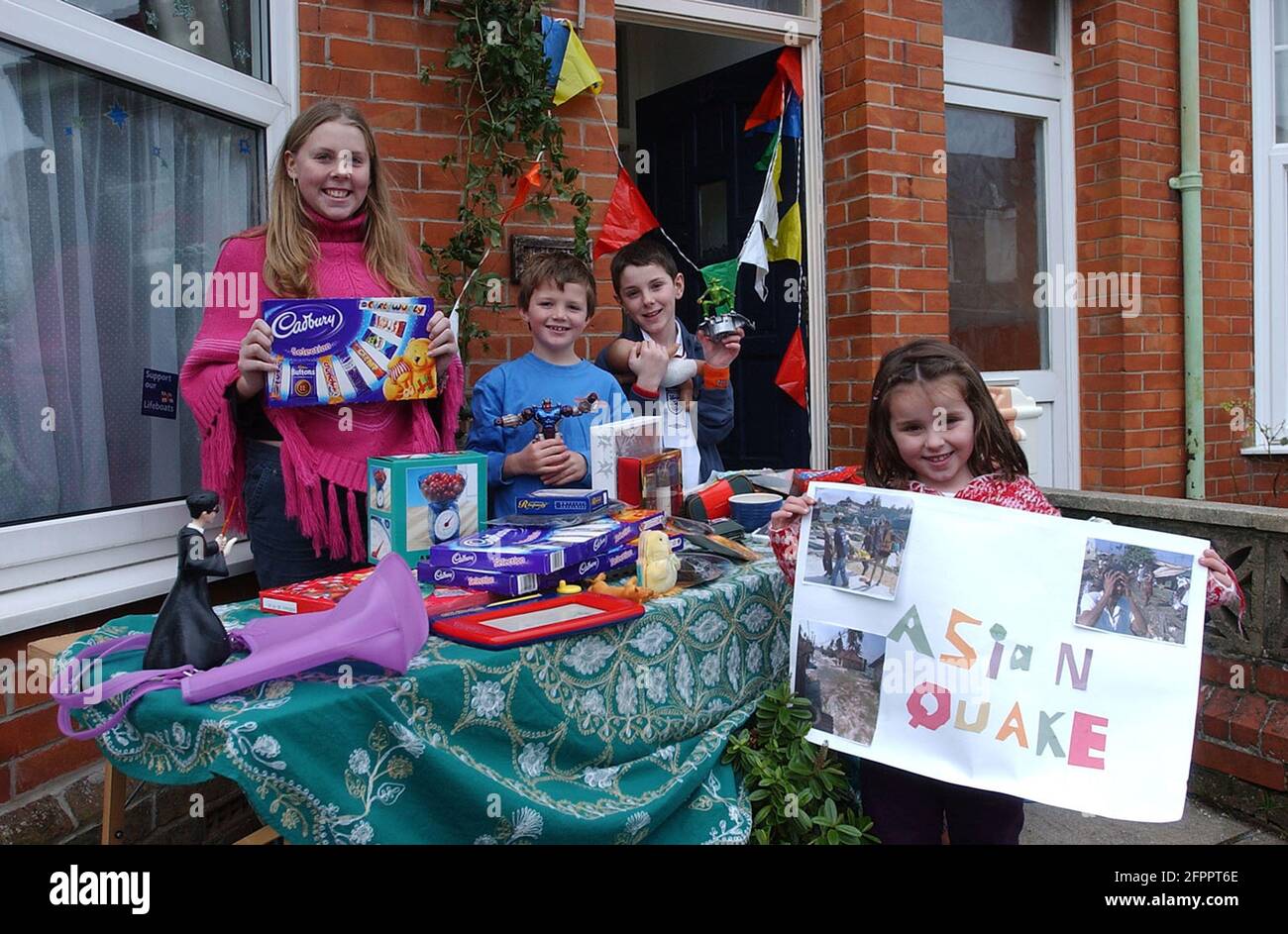 YOUNGSTERS AT THEIR STALL TORAISE MONEY FOR THE TSUNAMI VICTIMS IN ASIA ...