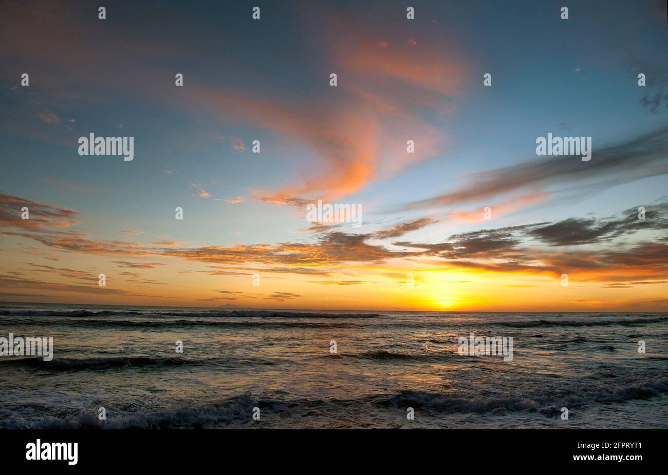 Colorful sunset over beach in Costa Rica Stock Photo - Alamy