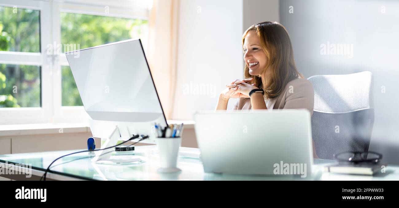 Corporate Support Service Agent On Desktop Computer Stock Photo - Alamy