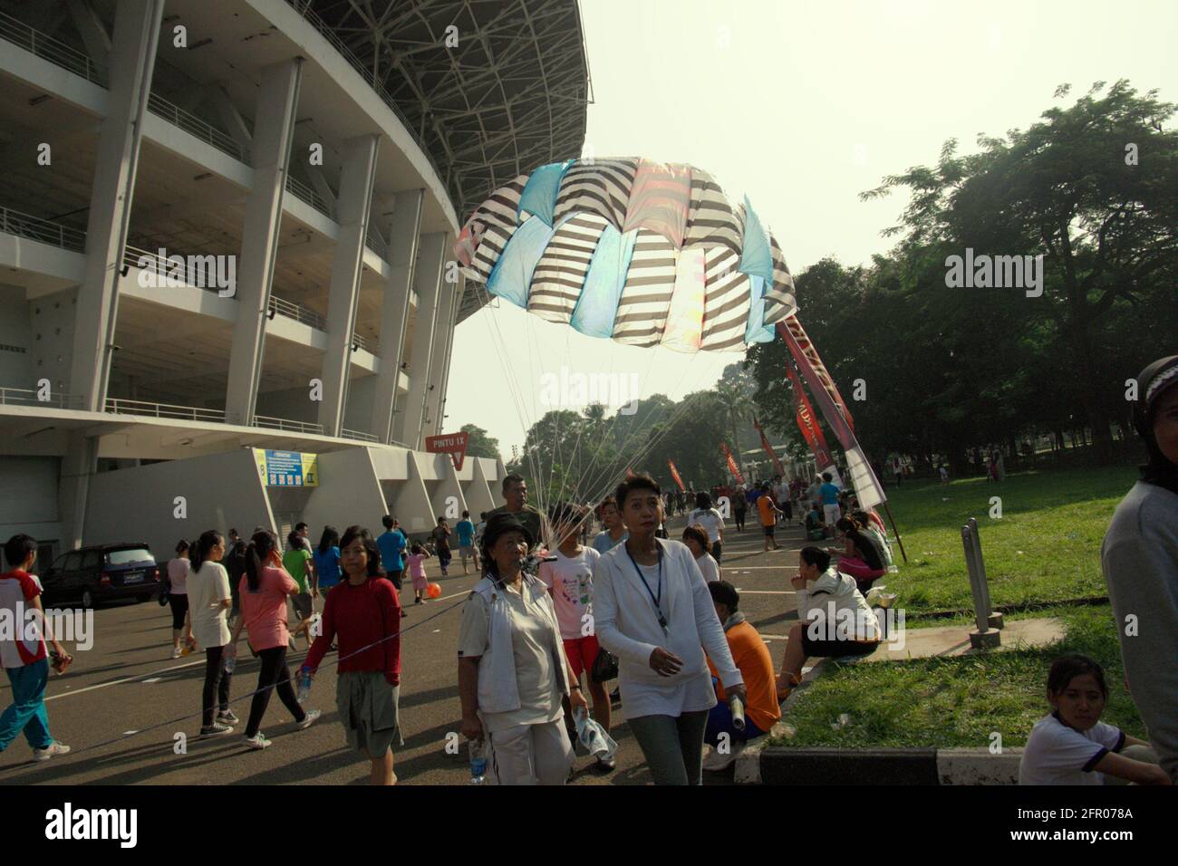 Jakarta citizens having recreational sport activity outside Senayan ...