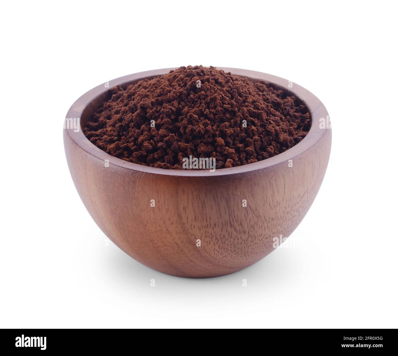 Coffee powder burst in bowl on white background Stock Photo - Alamy