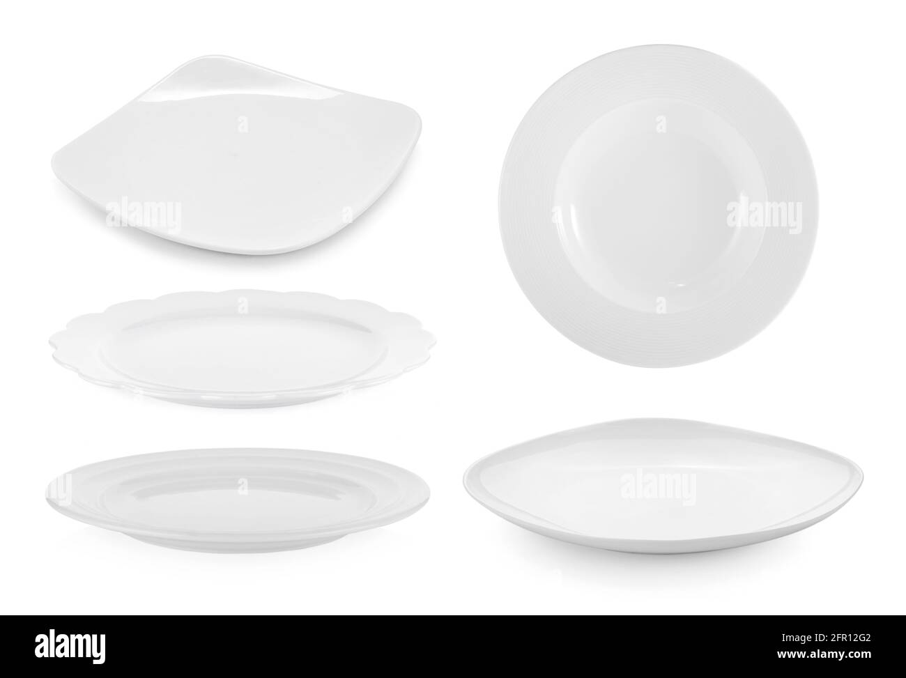 set of plate on white background Stock Photo - Alamy