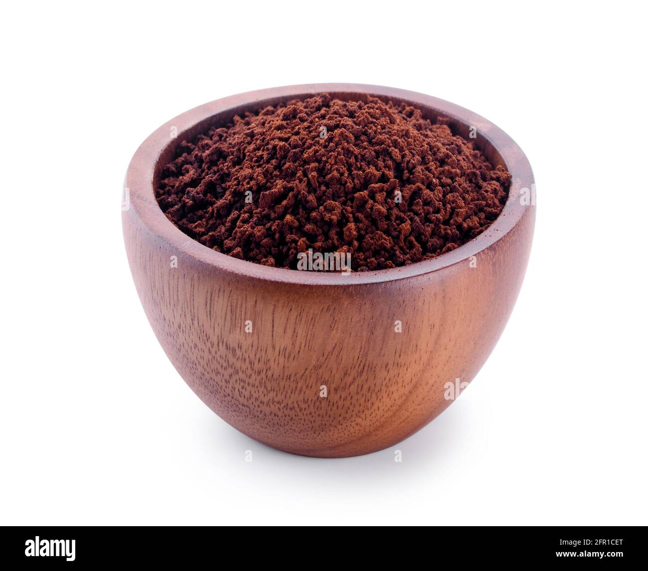 Coffee powder burst in bowl on white background Stock Photo - Alamy