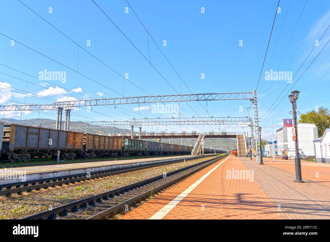 Landscape with a view of the railway at the station Slyudyanka, Irkutsk ...
